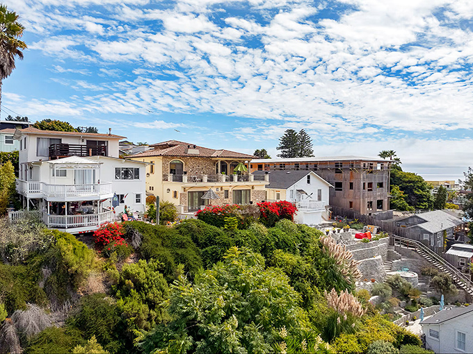 Hillside homes cascade down to the shoreline, offering residents daily doses of what the rest of us call "vacation views."