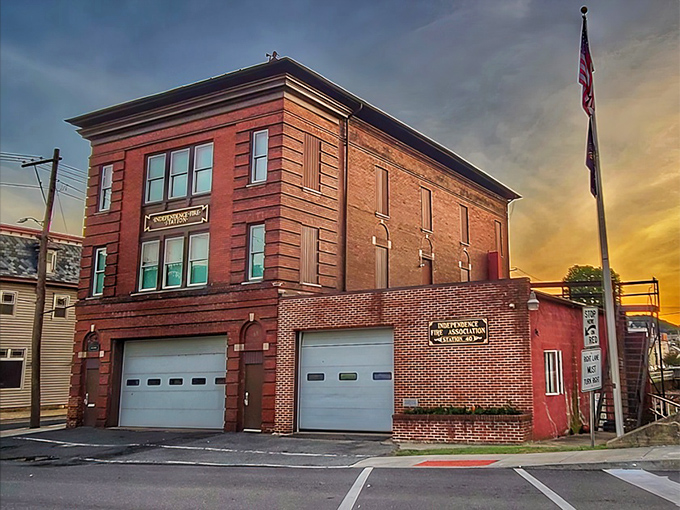 The Independence Fire Association building glows at sunset, a reminder that community service never retires in small-town Pennsylvania.