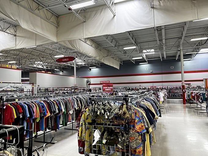 The vastness of the men's section, where Hawaiian shirts and vintage tees create a kaleidoscope of fashion possibilities from decades past.