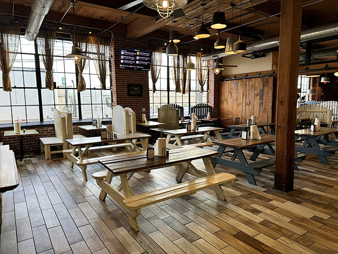 Picnic tables inside because sometimes barbecue tastes better when you're elbow-to-elbow with fellow enthusiasts.