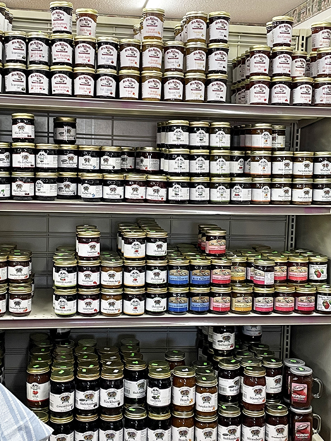 The jam and preserve section&mdash;where fruits go to achieve immortality. Rows of glistening jars containing summer sunshine, ready to brighten even the darkest winter morning.