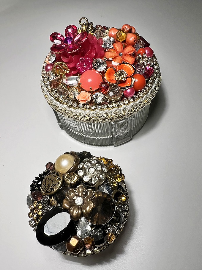 Vintage jewelry boxes transformed into tiny art galleries, where forgotten brooches and costume gems find new purpose as miniature masterpieces.