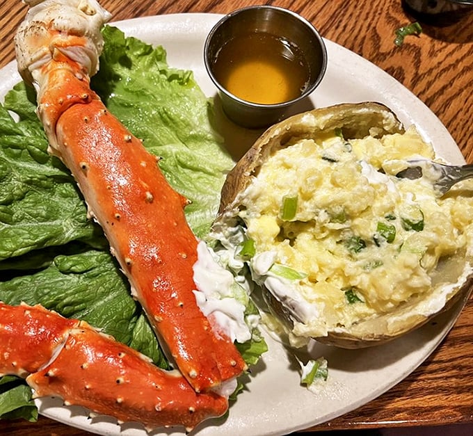 King crab legs that transport you straight to the ocean, regardless of Arizona's landlocked status. That baked potato looks like it's having an identity crisis as a twice-baked.