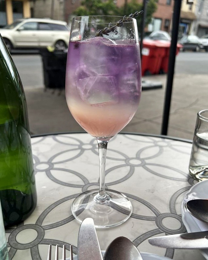 A cocktail that changes color like a mood ring. This lavender-infused beauty is what happens when bartenders become alchemists.