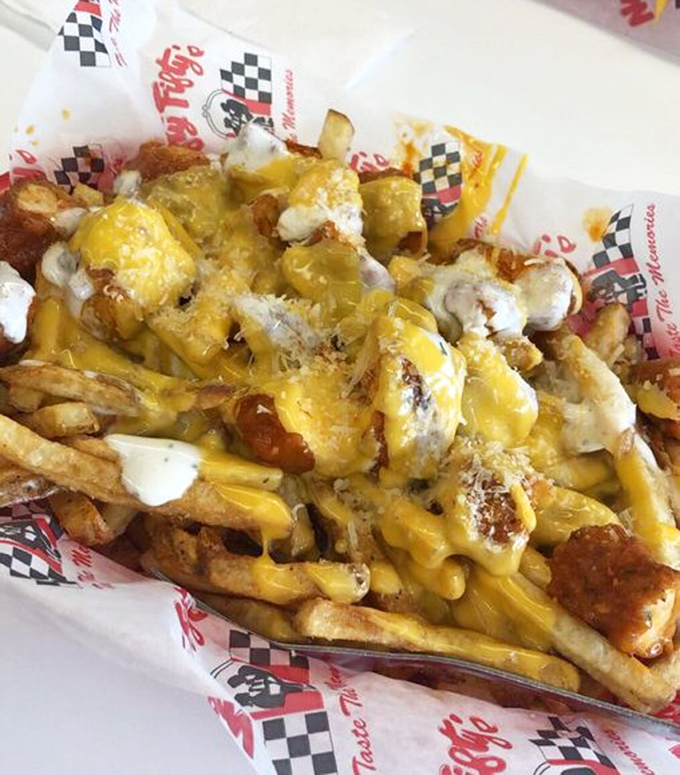 Loaded fries that laugh in the face of moderation—a beautiful avalanche of cheese, bacon, and whatever else the kitchen decided you deserved today.