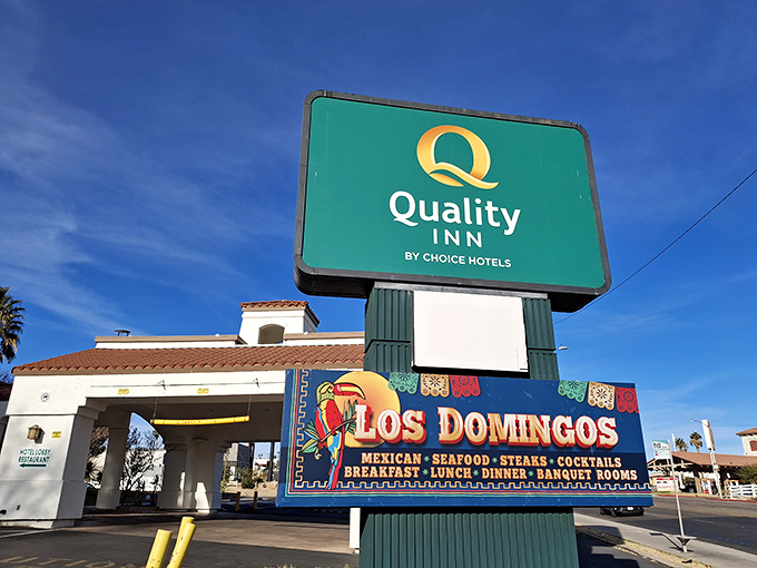 Los Domingos Restaurant promises authentic flavors beneath its vibrant sign, where desert appetites meet Mexican culinary traditions in a happy collision.