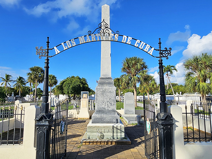 A Los Martires de Cuba archway marks a poignant cultural connection, where Key West's Cuban heritage is honored with dignified remembrance.