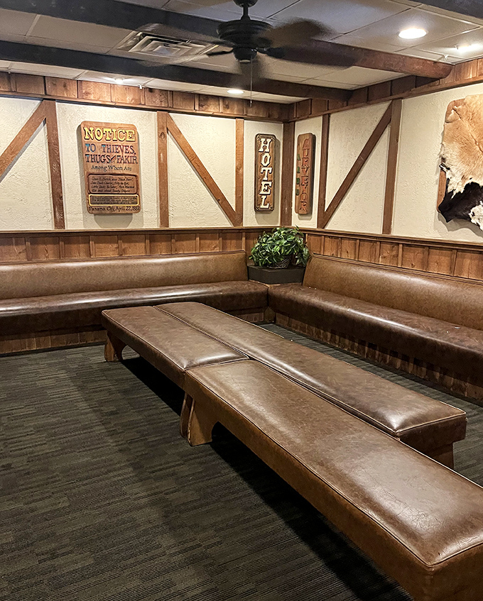 The waiting area's vintage Western vibe makes even the anticipation enjoyable. Those bench seats have heard decades of post-dinner satisfaction.