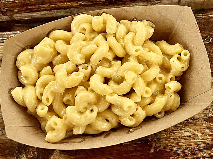 Mac and cheese that doesn't just accompany the BBQ&mdash;it demands equal billing. Creamy, cheesy perfection in a humble paper boat.