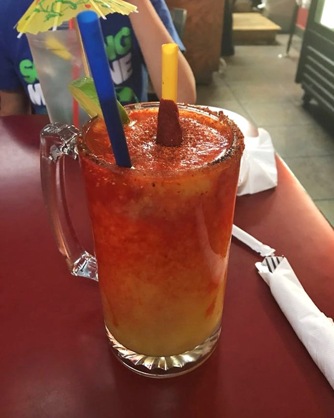 A mangonada that's part drink, part dessert, all celebration. Those colorful straws aren't just for sipping&mdash;they're for extending the joy.