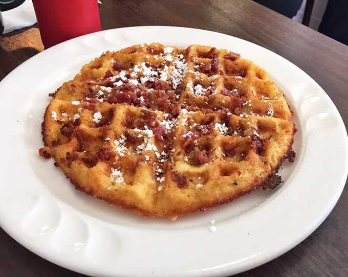 This isn't just any waffle—it's a maple bacon masterpiece. Breakfast's sweet and savory superstars joining forces on one perfect plate.