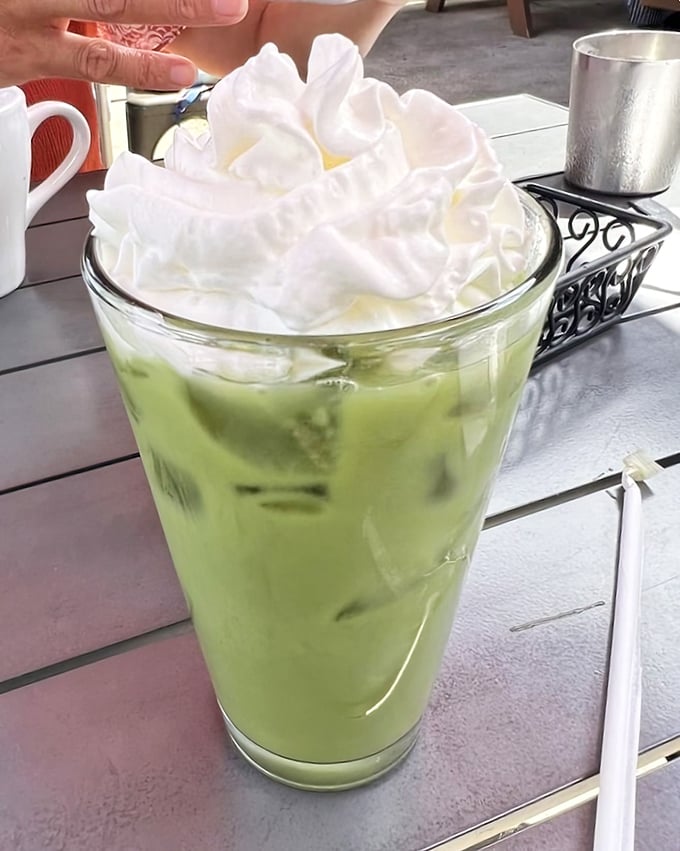 This isn't just a matcha drink&mdash;it's a tower of whipped cream atop a vibrant green sea of possibilities. Summer in a glass. 