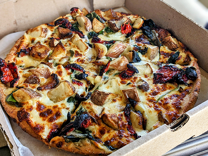 A pizza box revelation &ndash; chunks of roasted vegetables and charred edges that tell you this isn't some sad delivery chain compromise.