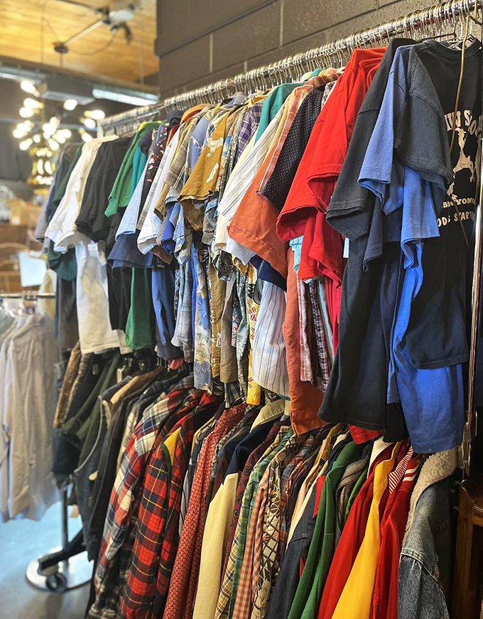 A technicolor timeline of men's fashion hanging patiently, waiting for their second act in someone's carefully curated wardrobe.