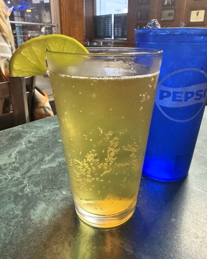 A cold beer with lime, because sometimes the perfect beverage isn't complicated&mdash;it's just cold, crisp, and ready when you are.