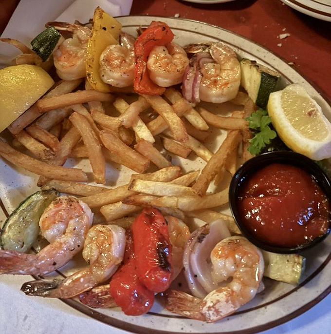 Grilled shrimp that taste like they jumped from ocean to fire with barely a pause. The colorful vegetables add both nutrition and eye candy to this plate of joy.