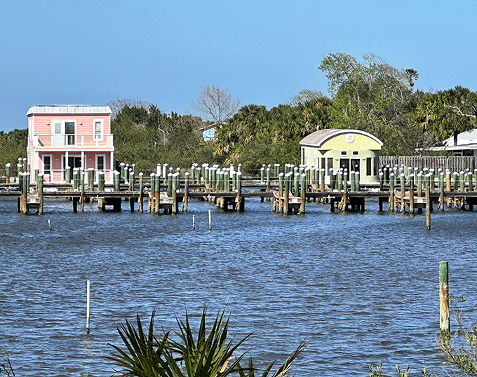 Colorful boathouses along the Intracoastal Waterway showcase Flagler's dual-water lifestyle, where residents enjoy both ocean and river access.