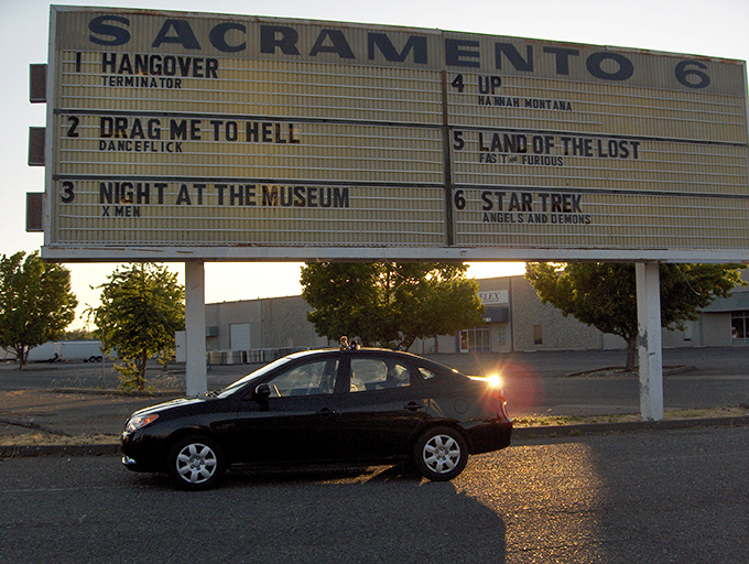 The marquee announces tonight's cinematic buffet. Six screens of escape, each promising a different journey without ever leaving your car.