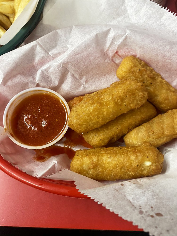 Mozzarella sticks with marinara &ndash; golden-brown on the outside, stretchy cheese paradise within, the appetizer that's never gone out of style for good reason.