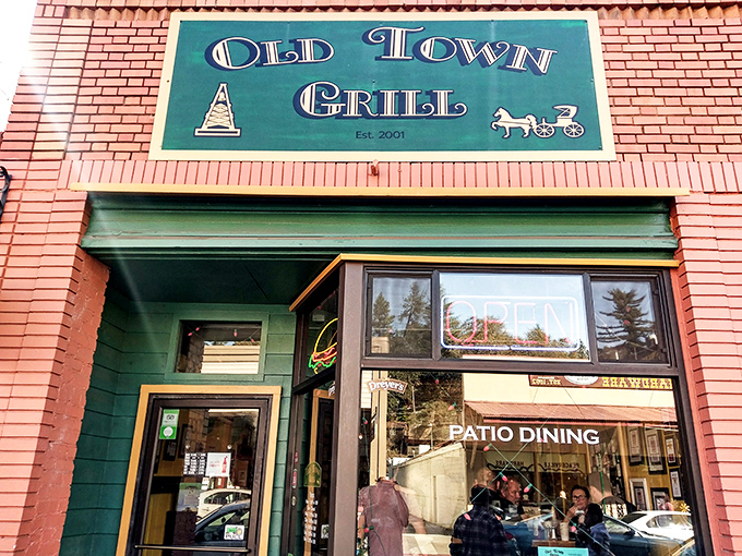Old Town Grill's welcoming storefront invites passersby to sit and stay awhile—the kind of local gathering spot where everybody knows your coffee order.