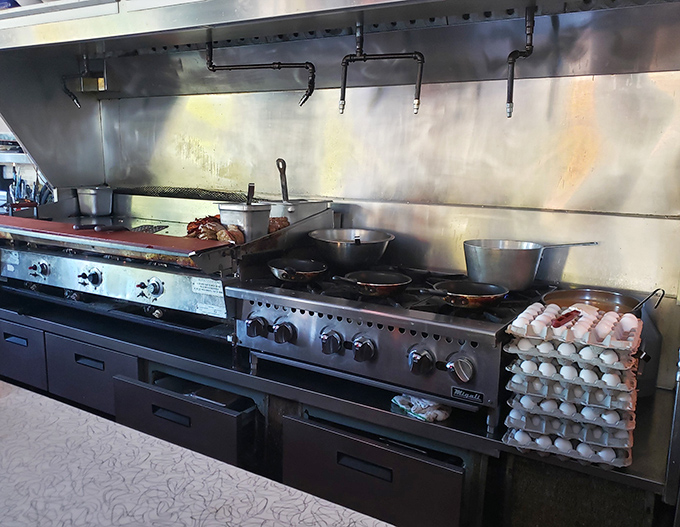 The beating heart of Howley's&mdash;an open kitchen where breakfast alchemy happens before your eyes. Those eggs aren't just cooking; they're performing!