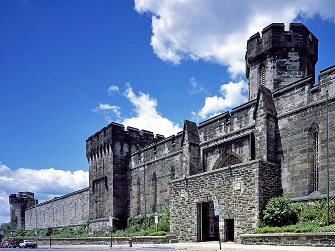 Medieval castle meets American corrections. Under blue skies, it's easy to forget this architectural marvel once housed thousands of America's most notorious criminals.