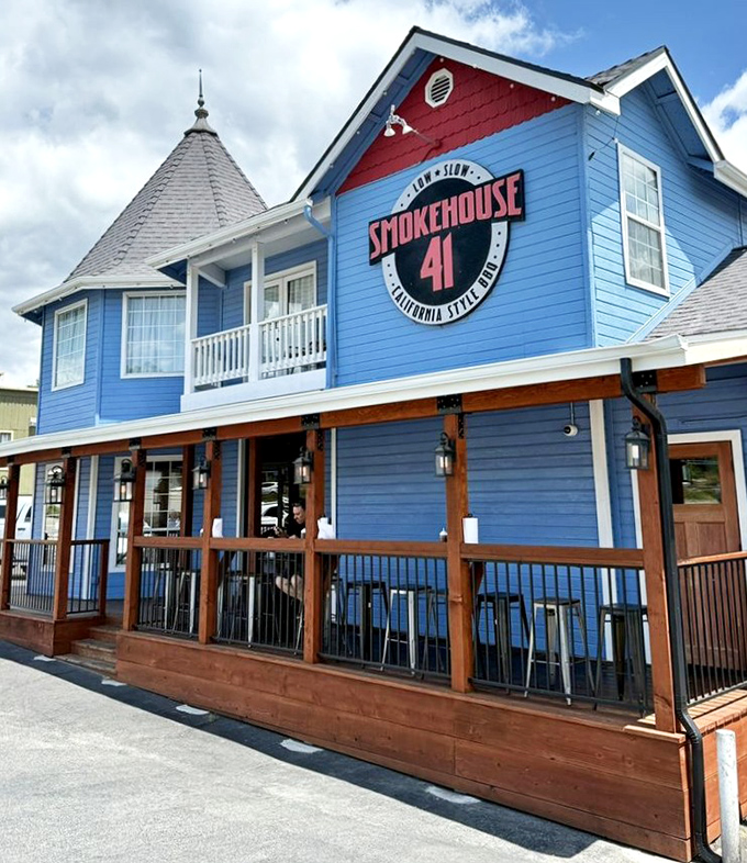 The distinctive blue exterior with red accents makes Smokehouse 41 an unmistakable landmark for barbecue pilgrims heading to Yosemite.