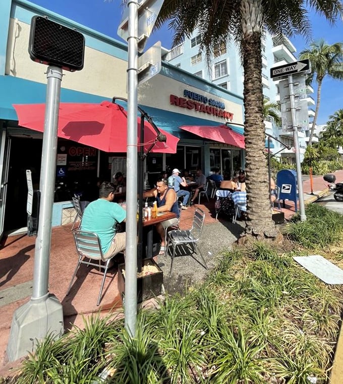 Sidewalk seating under Miami's palms&mdash;where the gentle breeze carries hints of garlic, coffee, and conversations in Spanglish.