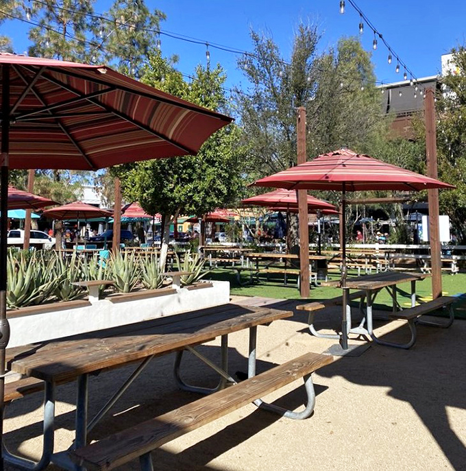 The outdoor patio offers desert dining perfection&mdash;shaded tables where you can enjoy your barbecue feast under Arizona's famously blue skies.