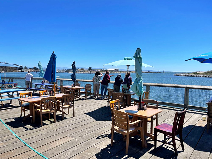 The outdoor deck—where fresh air, harbor views, and perfectly prepared seafood create the holy trinity of dining experiences.