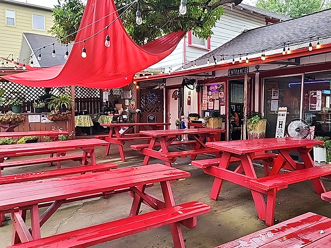 The outdoor seating area isn't just a place to eat&mdash;it's Houston's communal dining room where strangers become friends over shared burger appreciation.