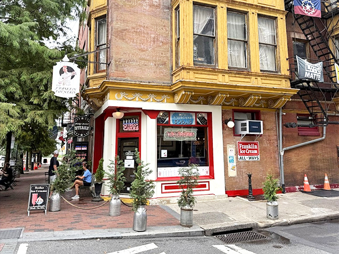 The corner view that's launched a thousand cravings. Those milk jugs repurposed as planters are just another charming touch in this ice cream wonderland.
