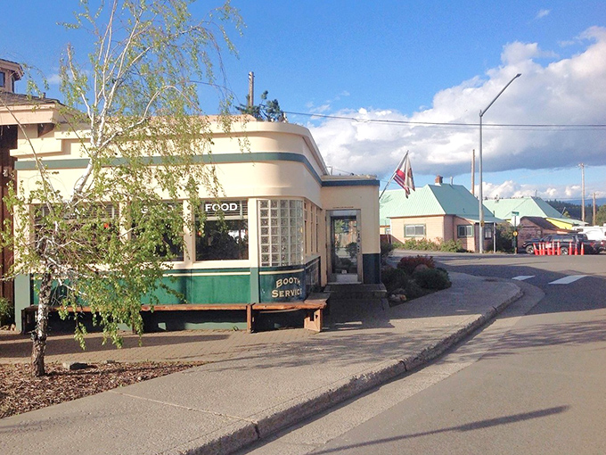 The curved corner of this vintage diner whispers stories of road trips, first dates, and countless cups of coffee shared over decades.