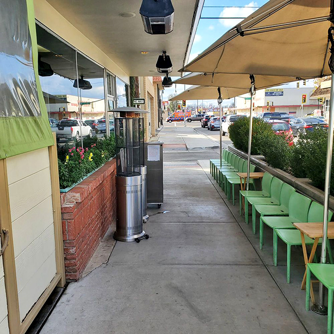 Green chairs line the sidewalk patio&mdash;a perfect perch for people-watching while waiting for your table at this beloved Bakersfield institution.