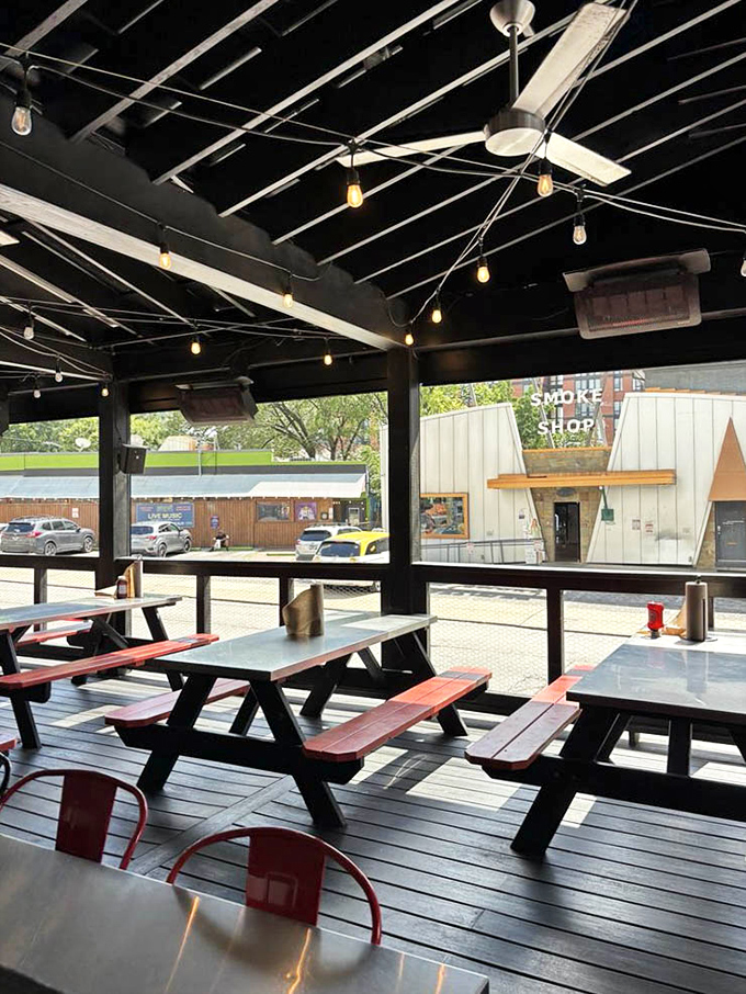 The covered patio offers fresh air without sacrificing shade—perfect for recovering from your bold choice to try the "Shut the Cluck Up!!!" heat level.