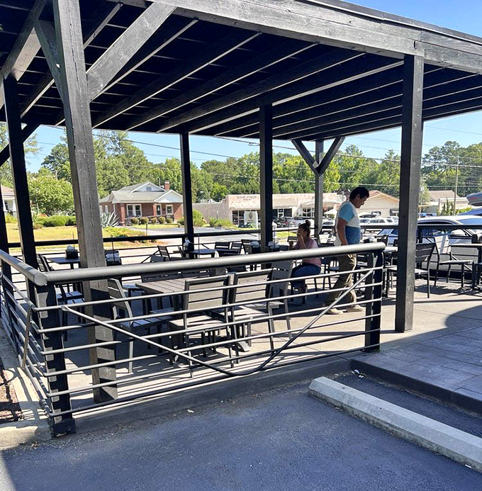 Covered outdoor seating extends the dining experience beyond four walls into fresh Carolina morning air.