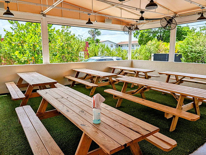 Outdoor seating that invites you to linger, surrounded by greenery and the occasional barbecue-scented breeze. These picnic tables have stories to tell.