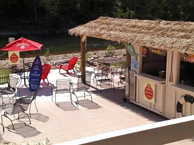 Tiki hut paradise by the Susquehanna. Those red Adirondack chairs aren't just seating&mdash;they're front-row tickets to nature's most relaxing show.