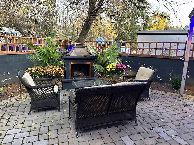 The outdoor seating area with its fireplace isn't just a place to eat&mdash;it's an invitation to linger, converse, and turn a meal into a memory.