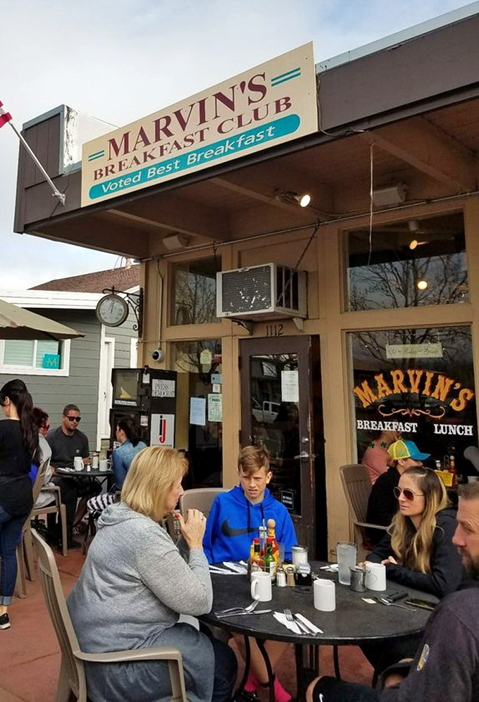 The bustling entrance proves Marvin's popularity &ndash; where patient diners gather at outdoor tables, knowing that breakfast perfection is worth the wait.