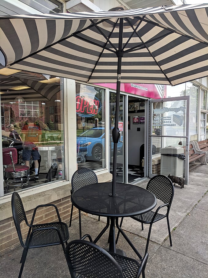 The outdoor seating area—where strangers become friends united by the universal language of "Oh my god, you have to try this!"