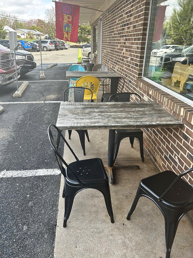 Even the outdoor seating says "stay awhile"&mdash;rustic tables and industrial chairs creating a perfect perch for people-watching between bites of breakfast bliss.