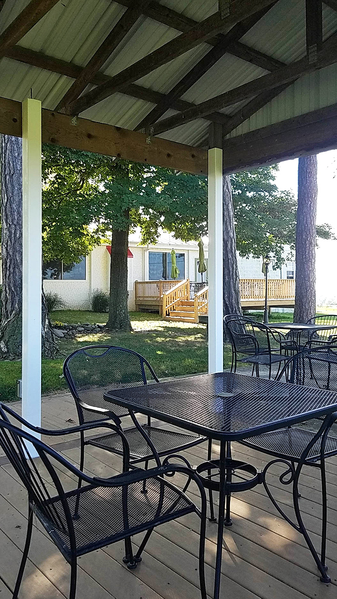 The covered patio offers a shaded retreat where you can enjoy your meal while gazing at the grounds &ndash; al fresco dining with a side of serenity.