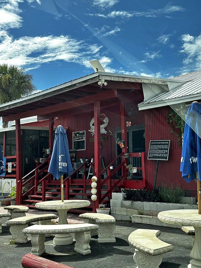 Outdoor seating for those brave enough to dine al fresco in gator country. These stone tables have witnessed countless seafood celebrations.