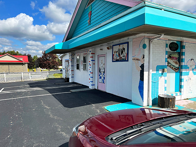 The exterior's playful pink and turquoise color scheme promises a dining experience that's anything but ordinary in this Canfield gem.