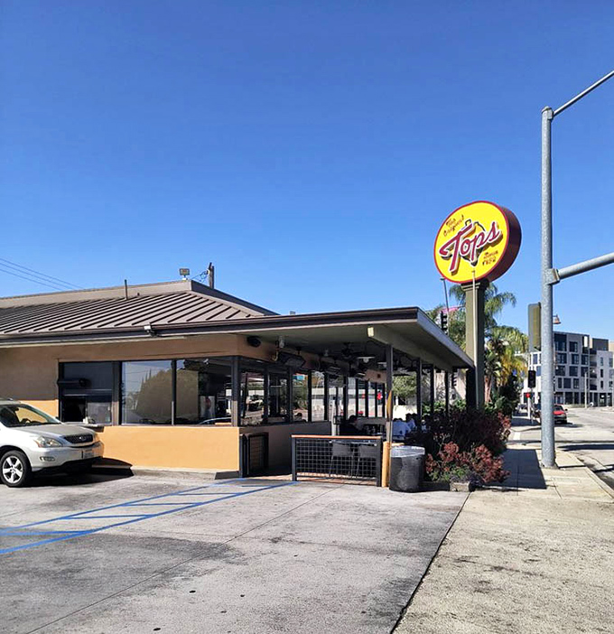 The classic drive-in architecture that makes you want to check if your car has tail fins and chrome bumpers.