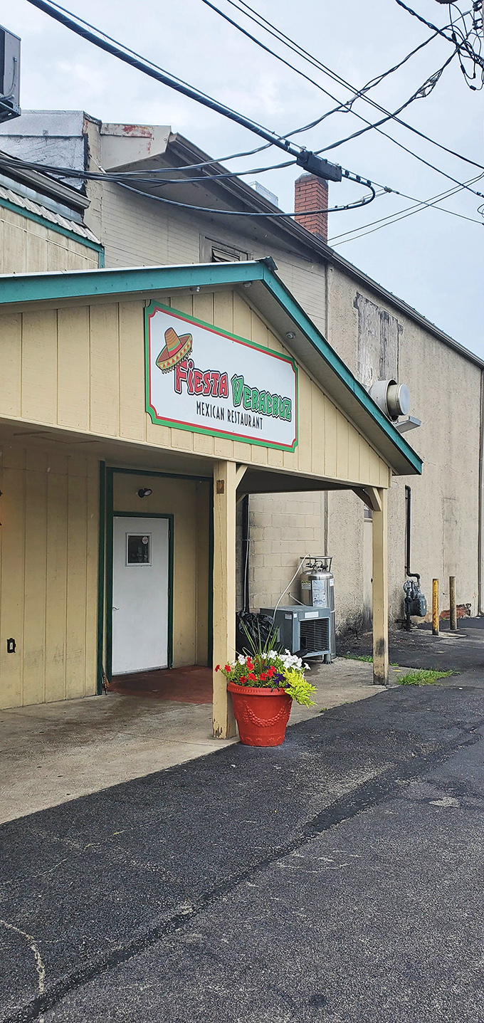 Even on a cloudy day, the cheerful yellow exterior and that red flower pot offer a warm welcome that says, "Yes, delicious food happens here."