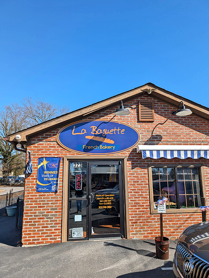 On sunny days, La Baguette's façade practically glows with possibility. That blue sign isn't just a logo—it's a beacon for carb-seekers throughout Delaware.