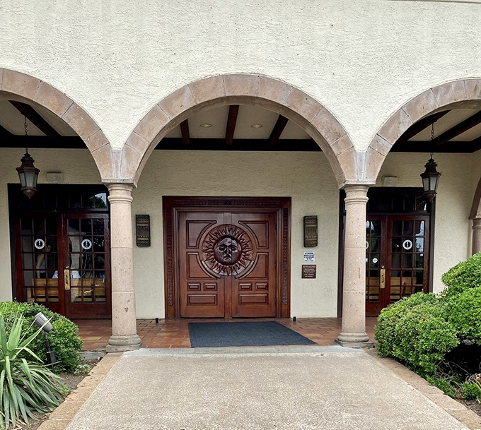 The entrance that feels like coming home, even on your first visit. Those carved wooden doors have welcomed everyone from local families to sitting presidents.