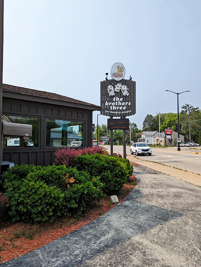 From this angle, you can almost hear the sign whispering, "Yes, we're still here, and yes, your favorite dish tastes exactly the same as it did last time."